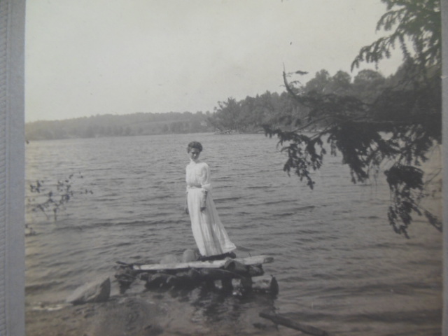 Photograph: Woman on a Rock in Findlay Lake (Ohio, 1908)